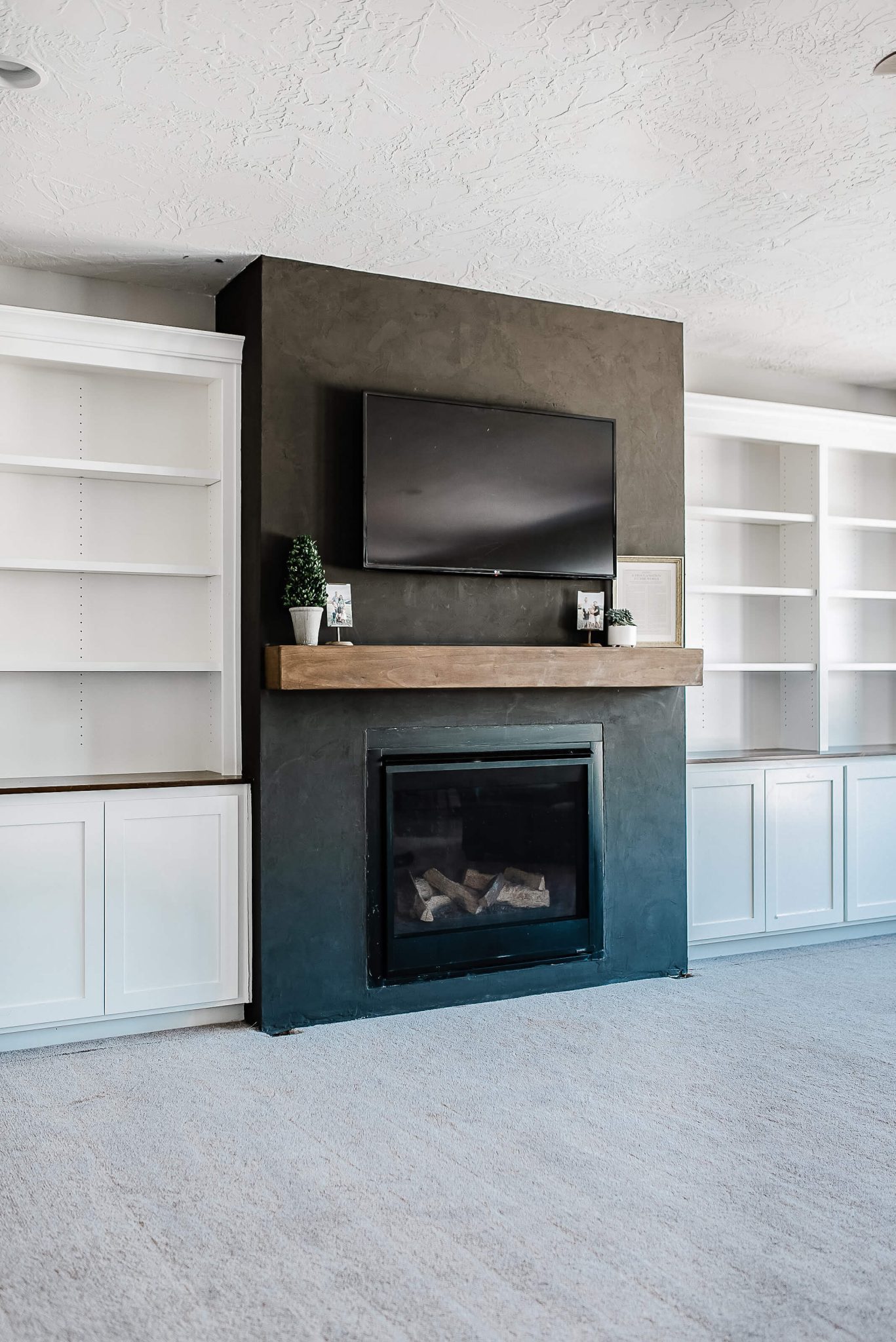 DIY Black Roman Clay Fireplace - Crystel Montenegro Home