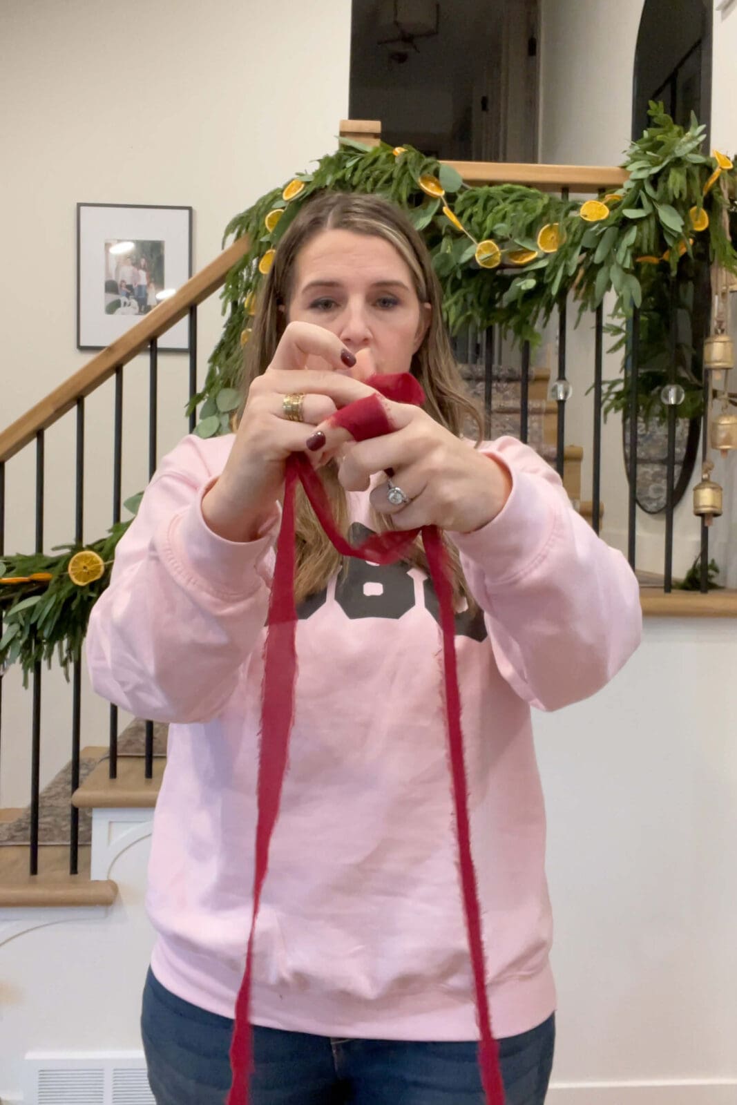 How to Decorate With Christmas Garland on a Staircase | Crystel ...