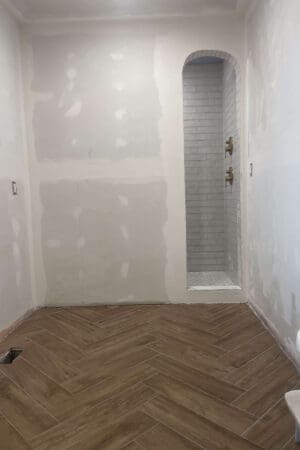 Laying a Herringbone Tile Floor in the Bathroom | Crystel Montenegro Home